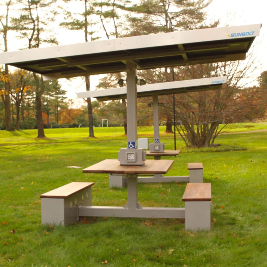 Charging Phone While Camping at a Solar Table